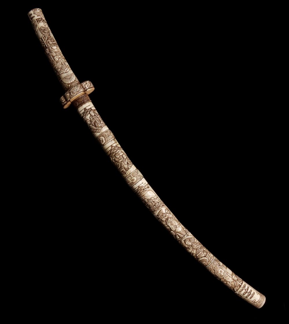 #7: A JAPANESE SWORD WITH HEAVILY CARVED IVORY SCABBARD